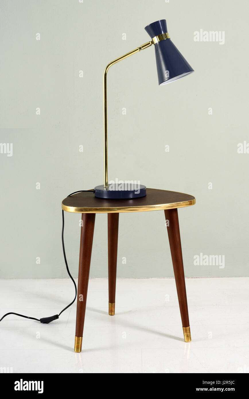 Vintage blue lamp over a wooden stool Stock Photo - Alamy