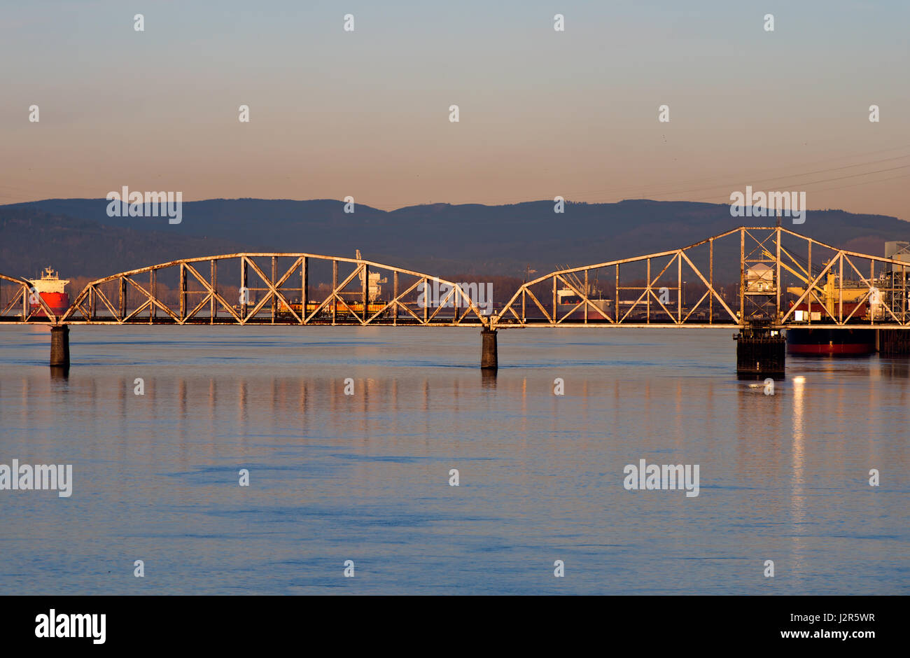 Sectional arch truss swing bridge turning on legs with twist mechanism ...