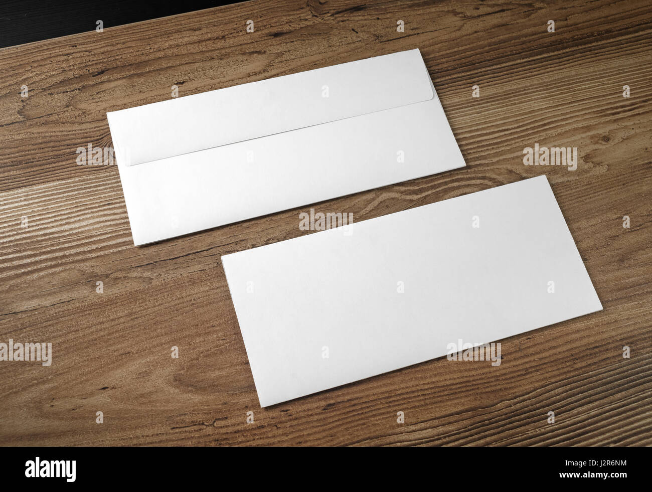 Blank envelopes on wooden table background. Front and back side Stock ...