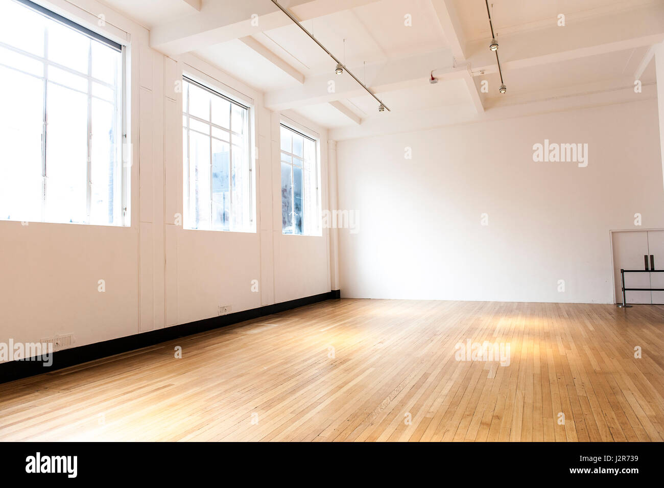 White empty room illuminated by sunlight Stock Photo - Alamy