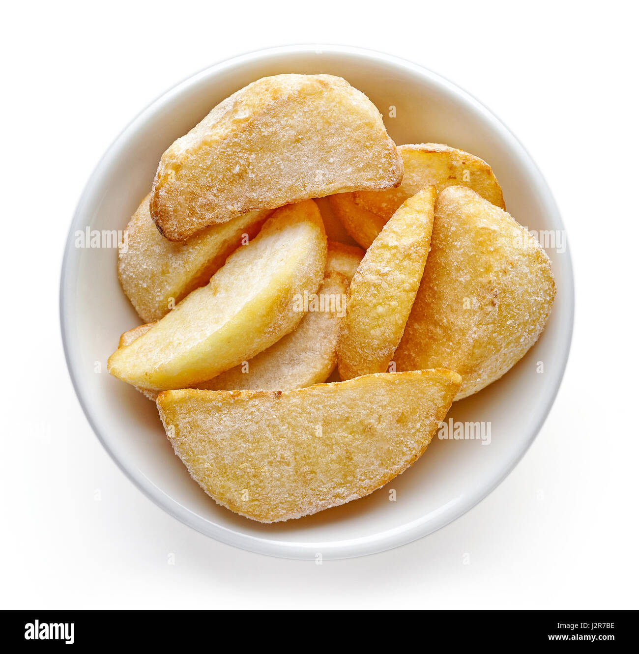 Bowl of frozen potato wedges isolated on white background, top view ...
