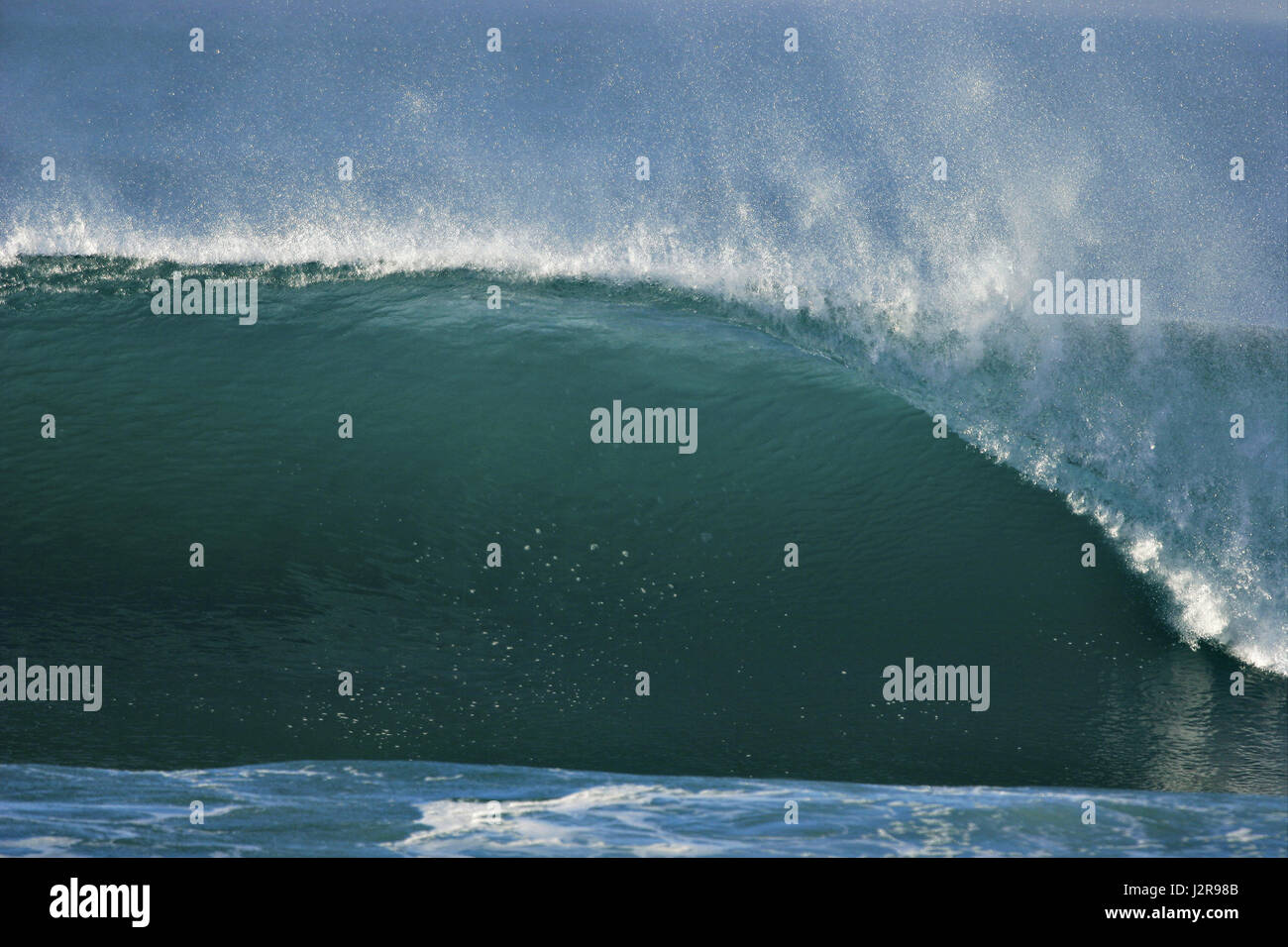 A beautiful blue ocean wave Stock Photo - Alamy