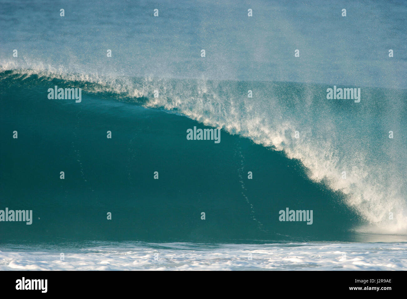 A beautiful blue ocean wave Stock Photo - Alamy