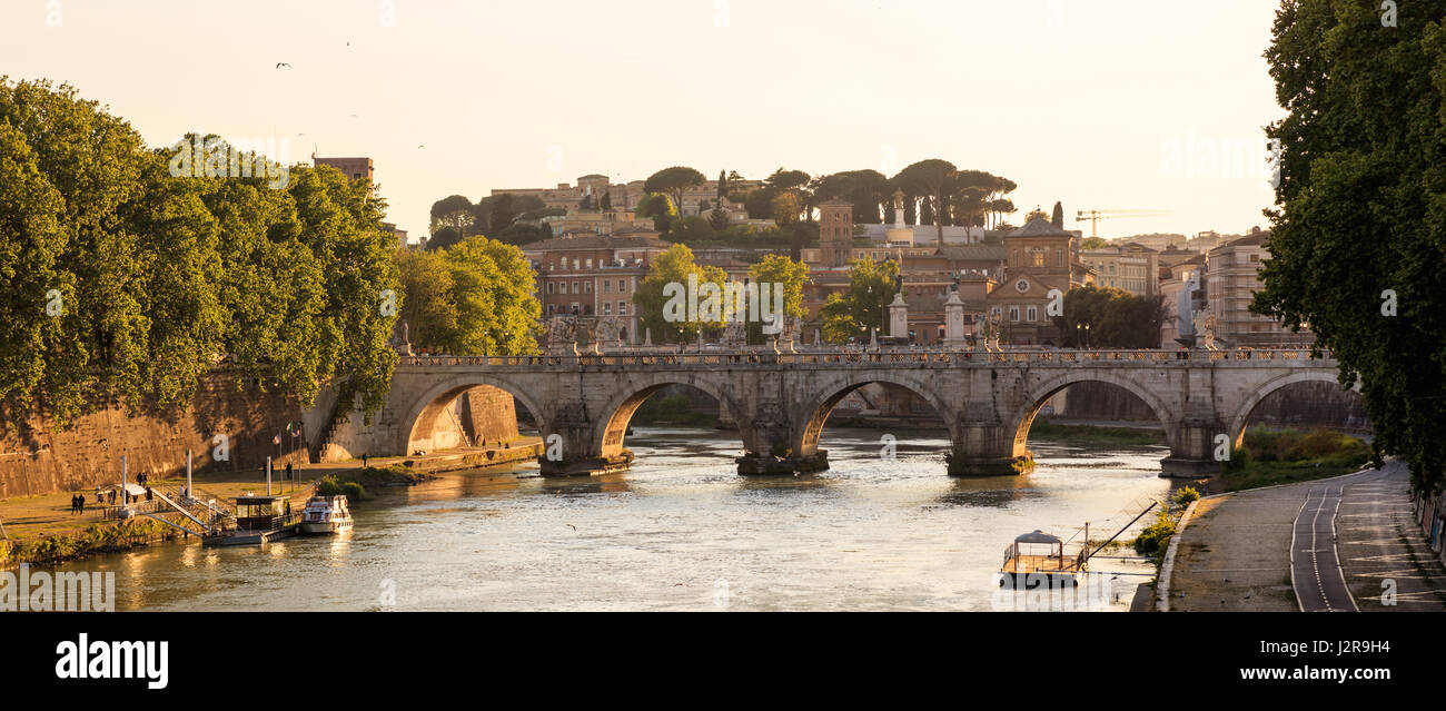 Bridge over Tiber river in Rome, Italy Stock Photo - Alamy