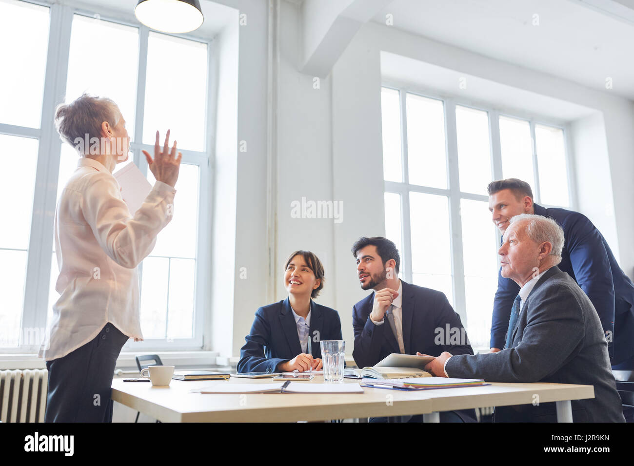 Consulting woman as seminar speaker in business presentation Stock ...