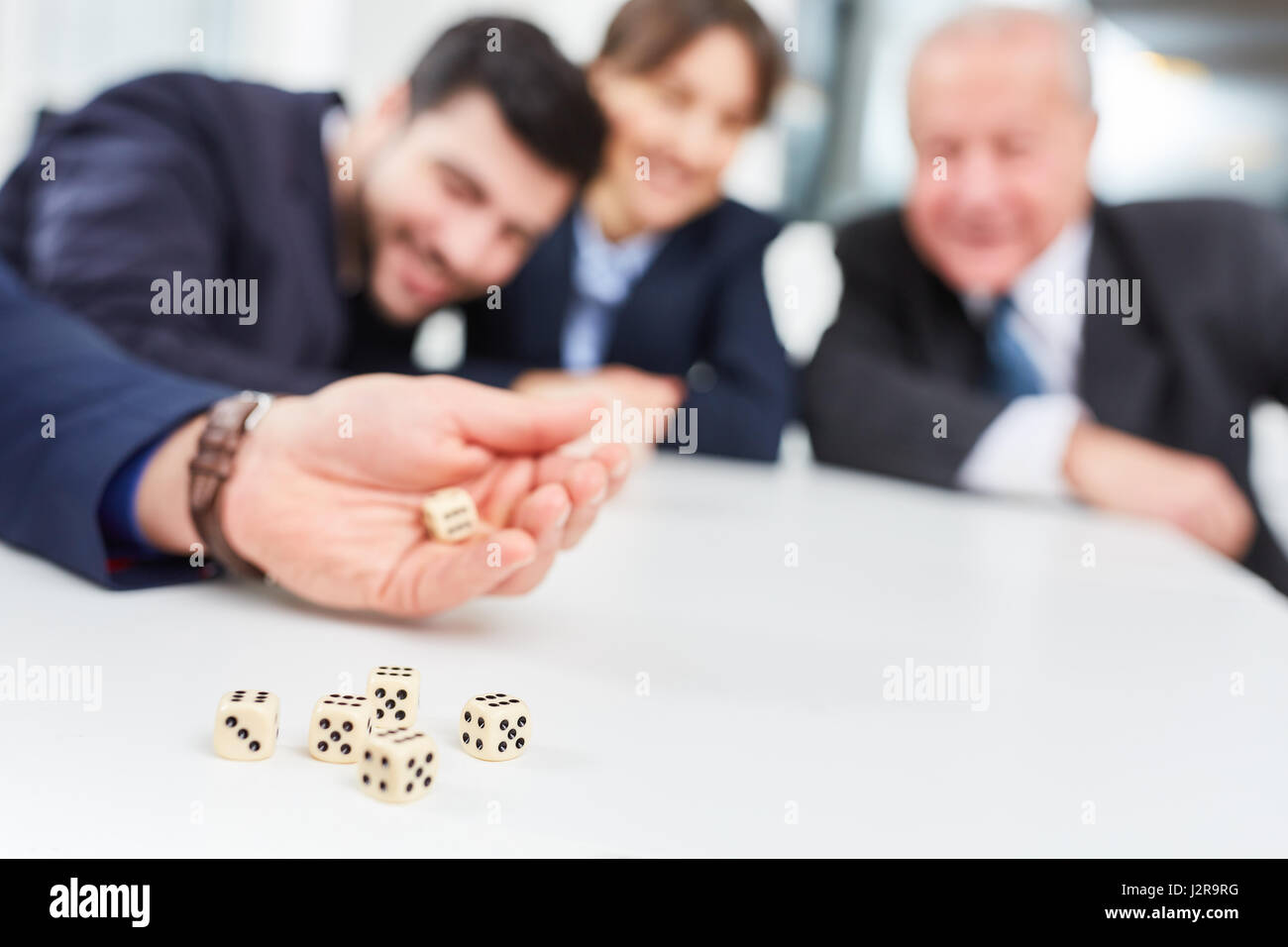 Dice game team training exercise in teambuilding workshop Stock Photo ...