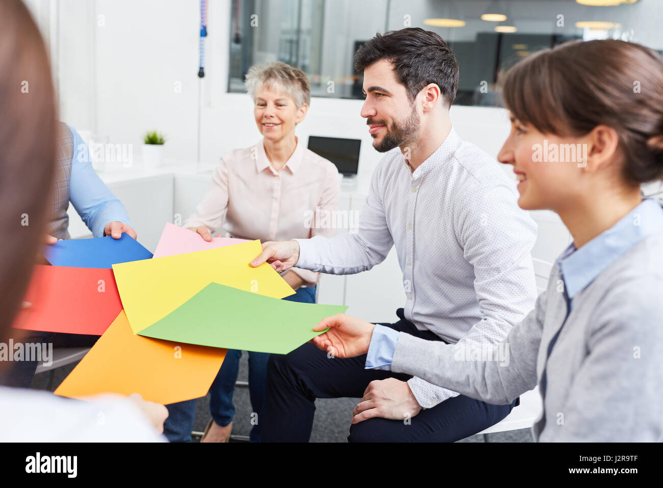 Startup team building exercise for creative success Stock Photo - Alamy