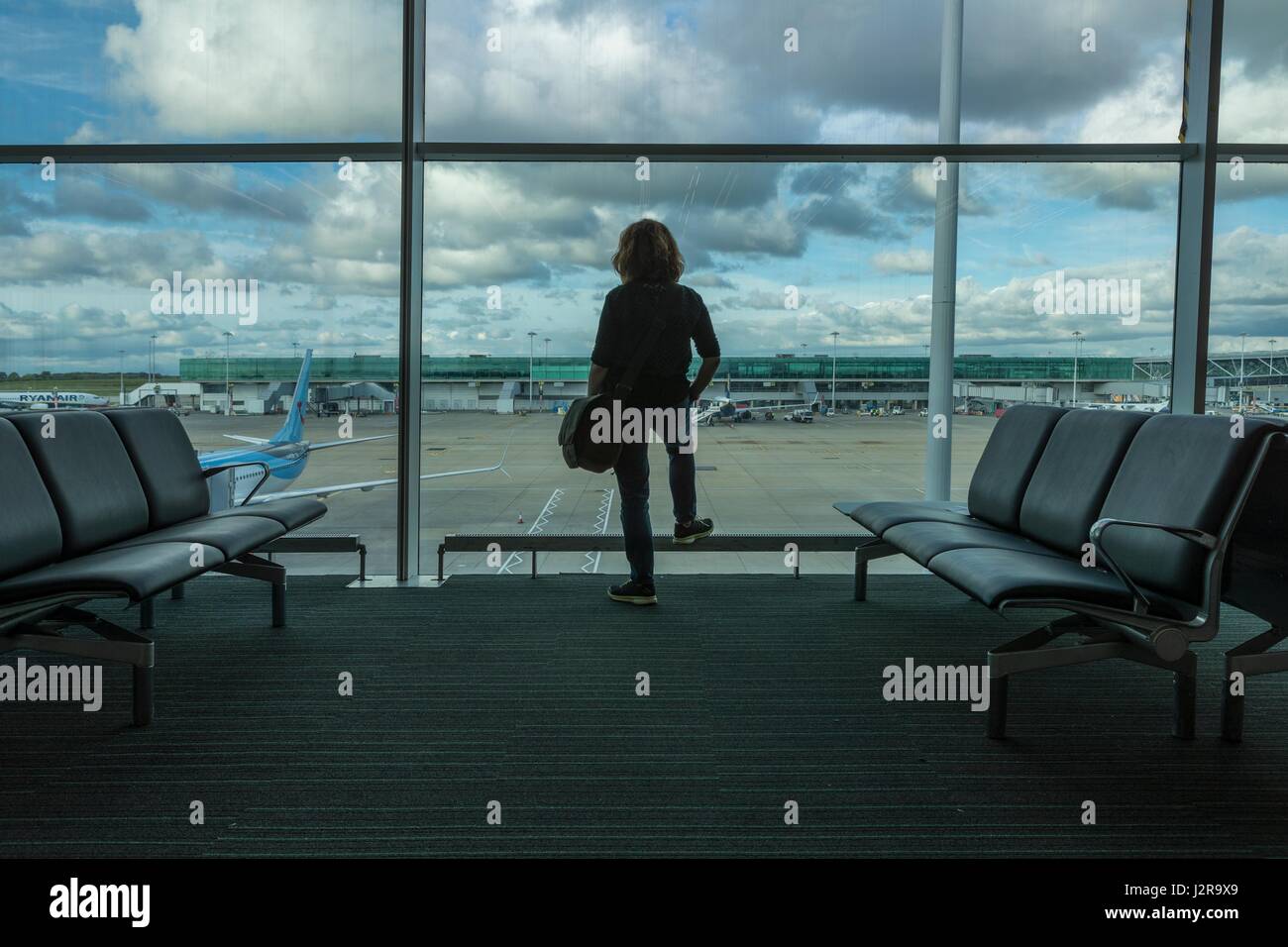 Passenger waiting in departure lounge for delayed flight Stock Photo ...