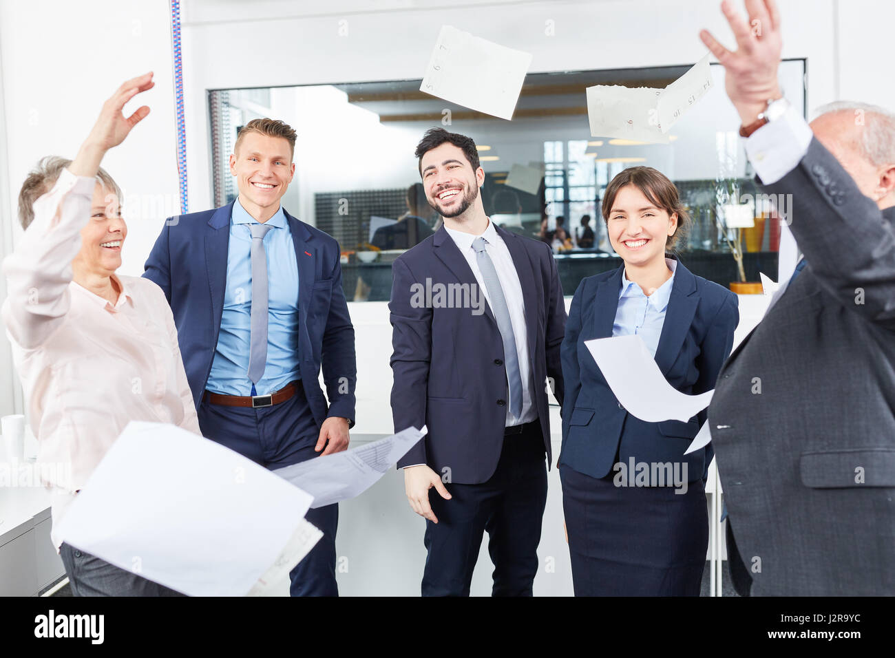 Celebration of successful business team full of joy Stock Photo - Alamy