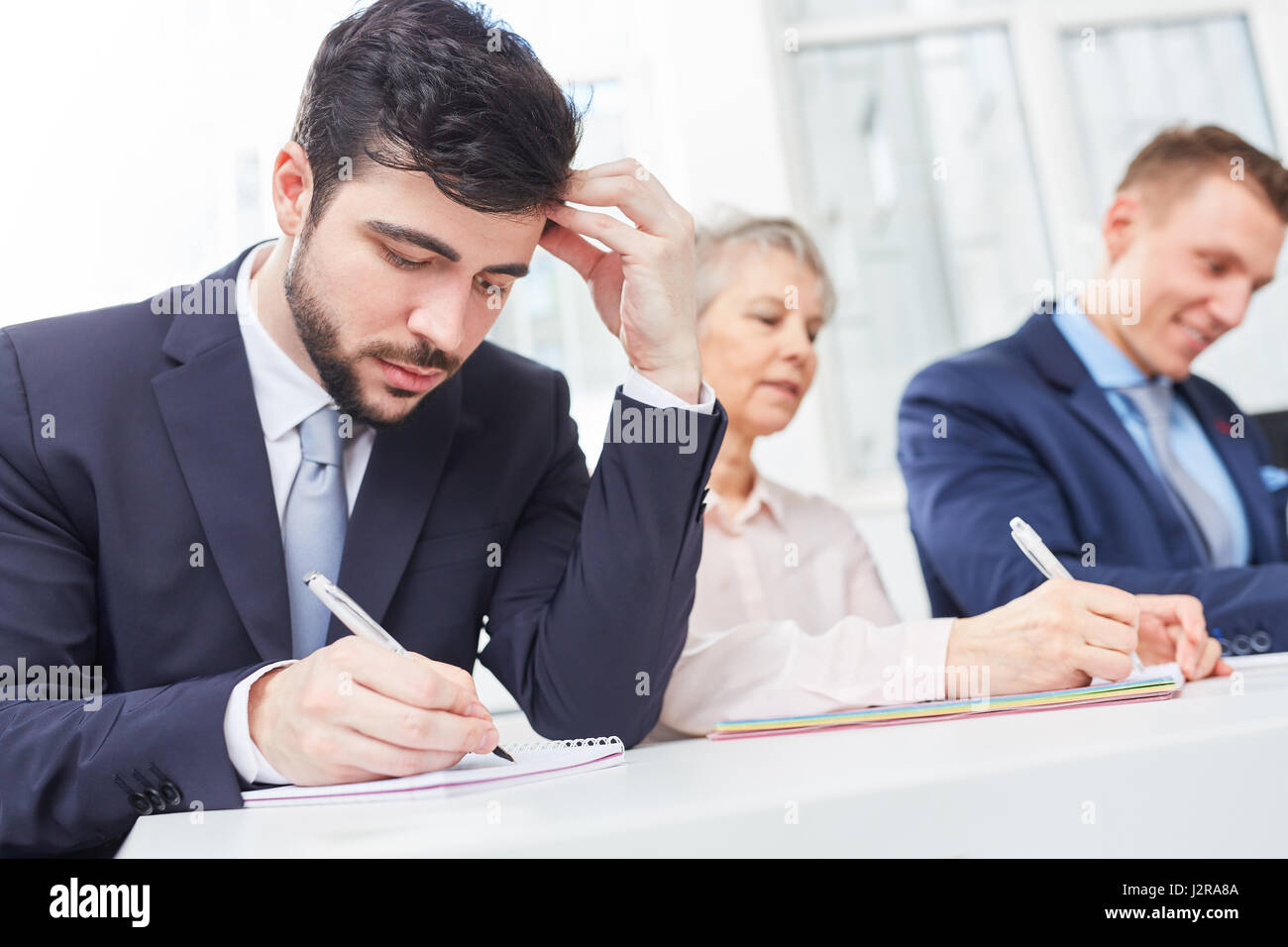 Man as candidate presenting test with concentration in assessment ...