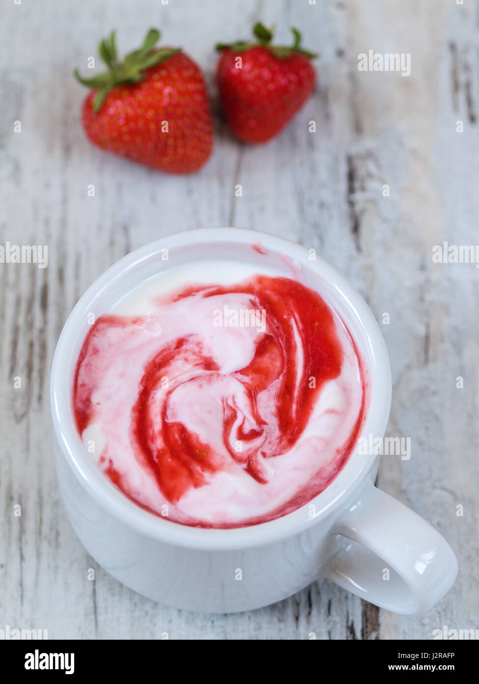 Tasty Strawberries yoghurt Stock Photo - Alamy
