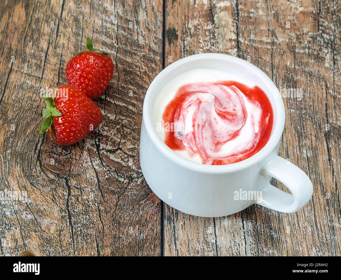 Tasty Strawberries yoghurt Stock Photo - Alamy