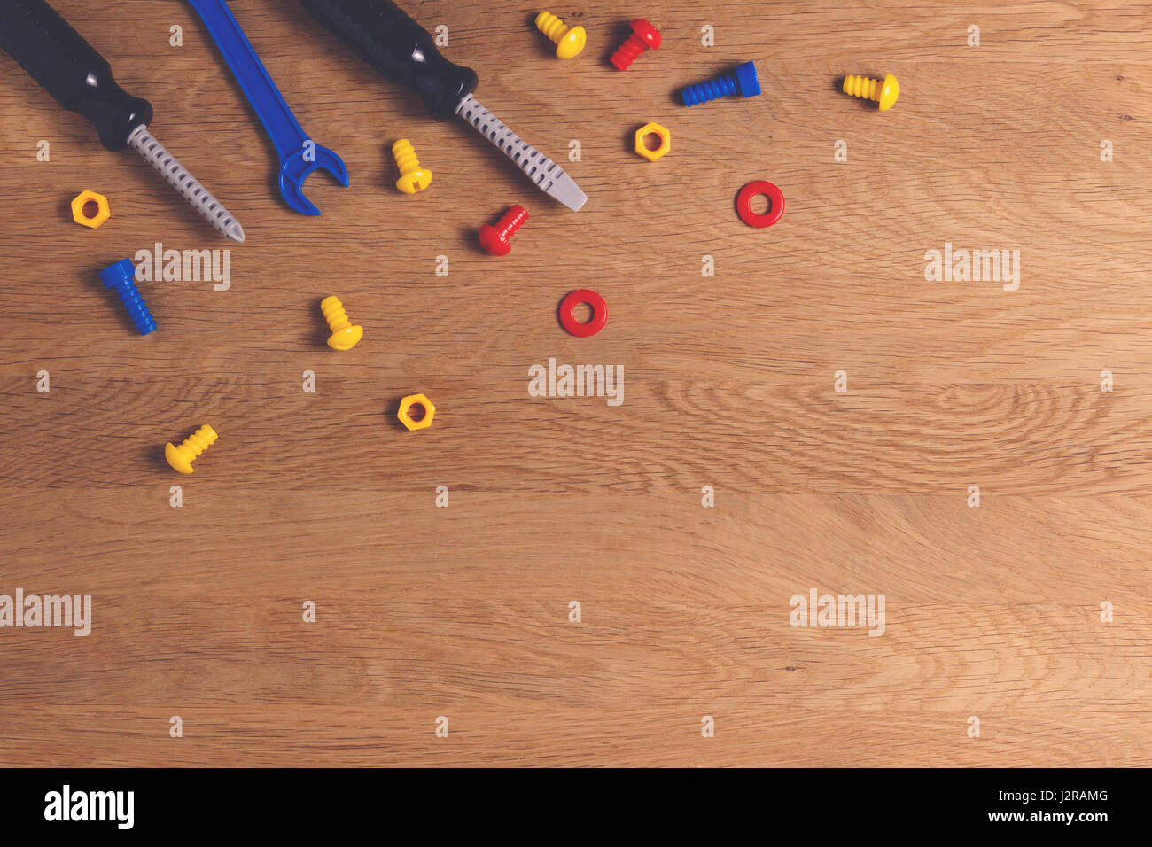 Kids construction toys tools: colorful screwdrivers, screws and nuts on ...