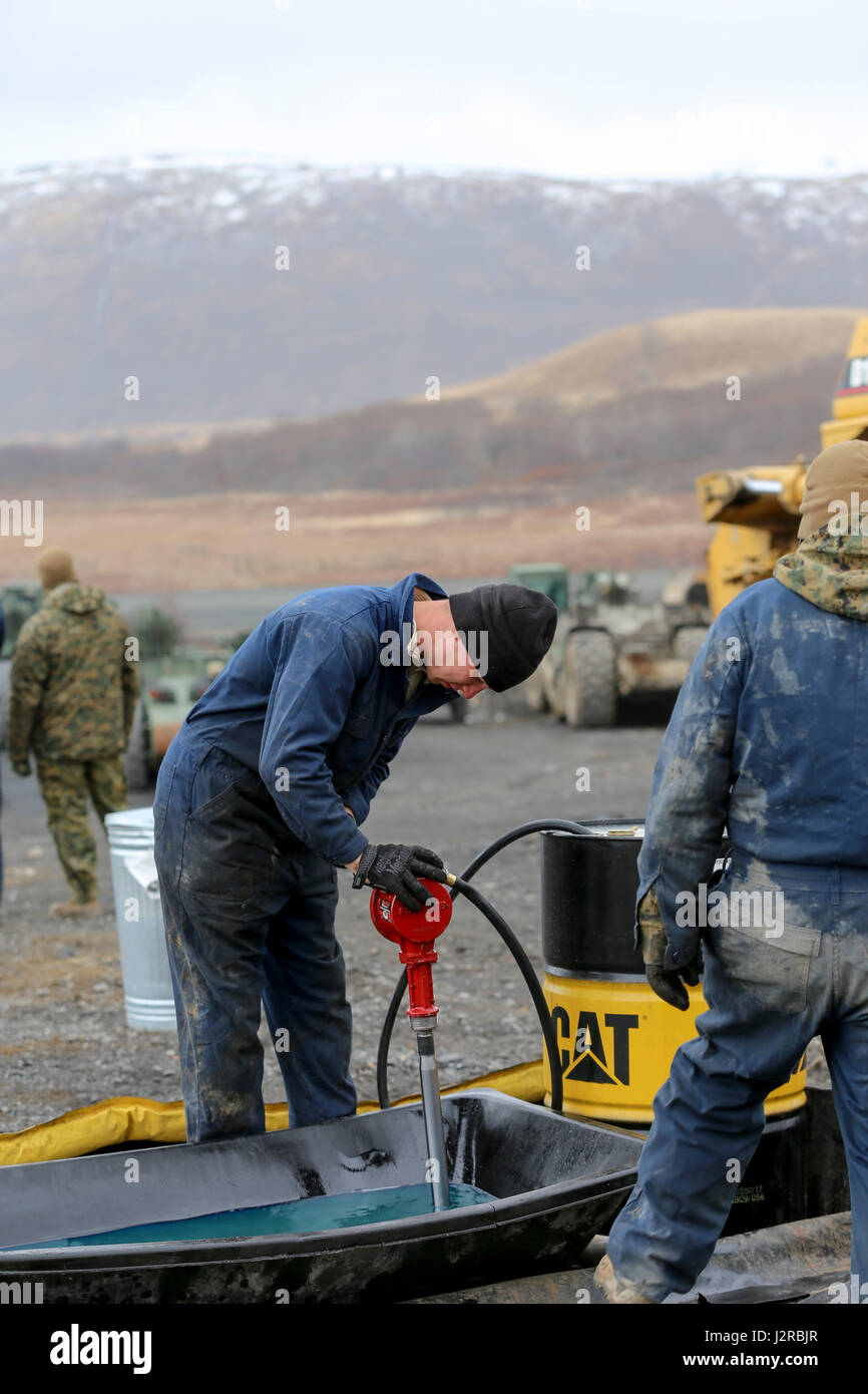 Alaska Guardsman Spc. Travis Cooper, a wheeled vehicle mechanic, 207th ...