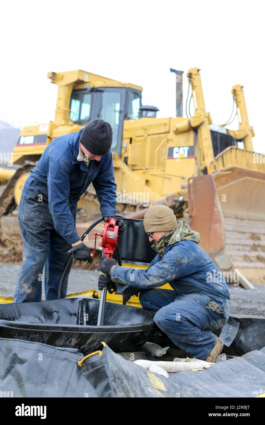 Alaska Guardsman Spc. Travis Cooper, a wheeled vehicle mechanic, 207th ...