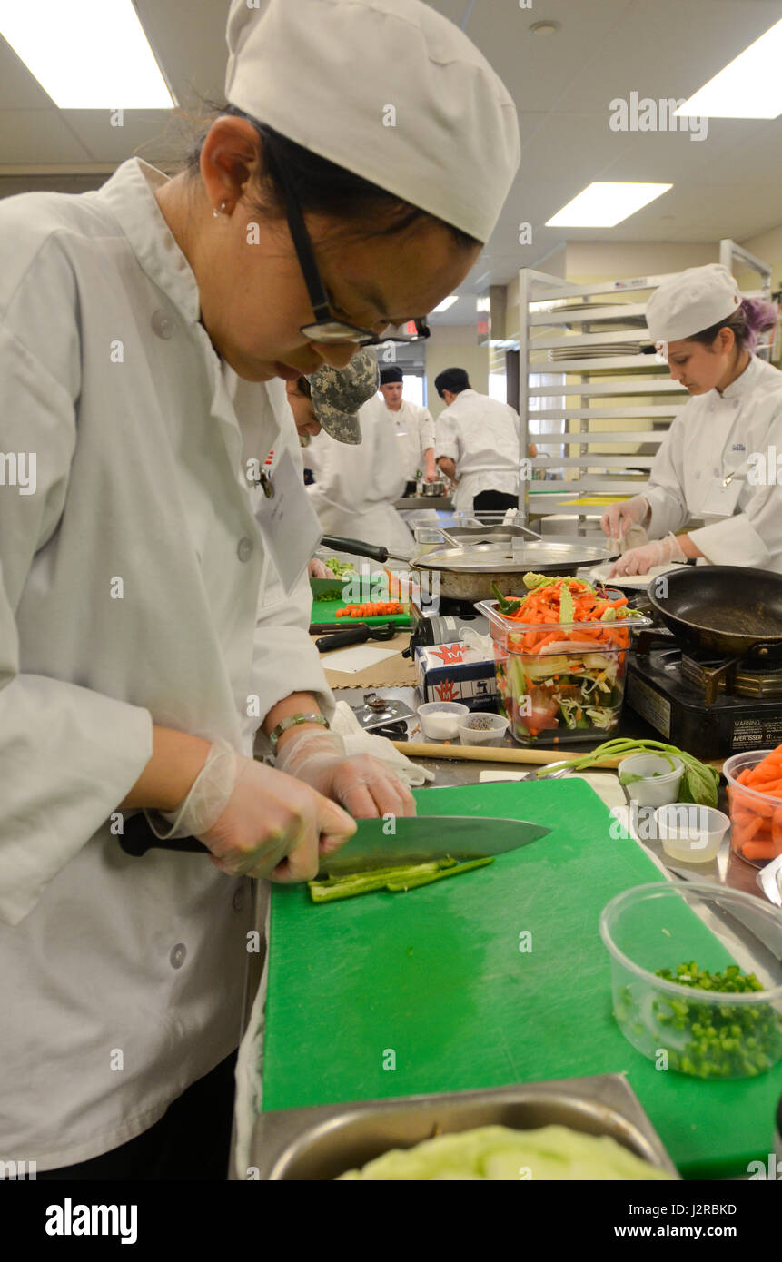 Culinary students prepare meals during the Skills USA 2017 competition ...