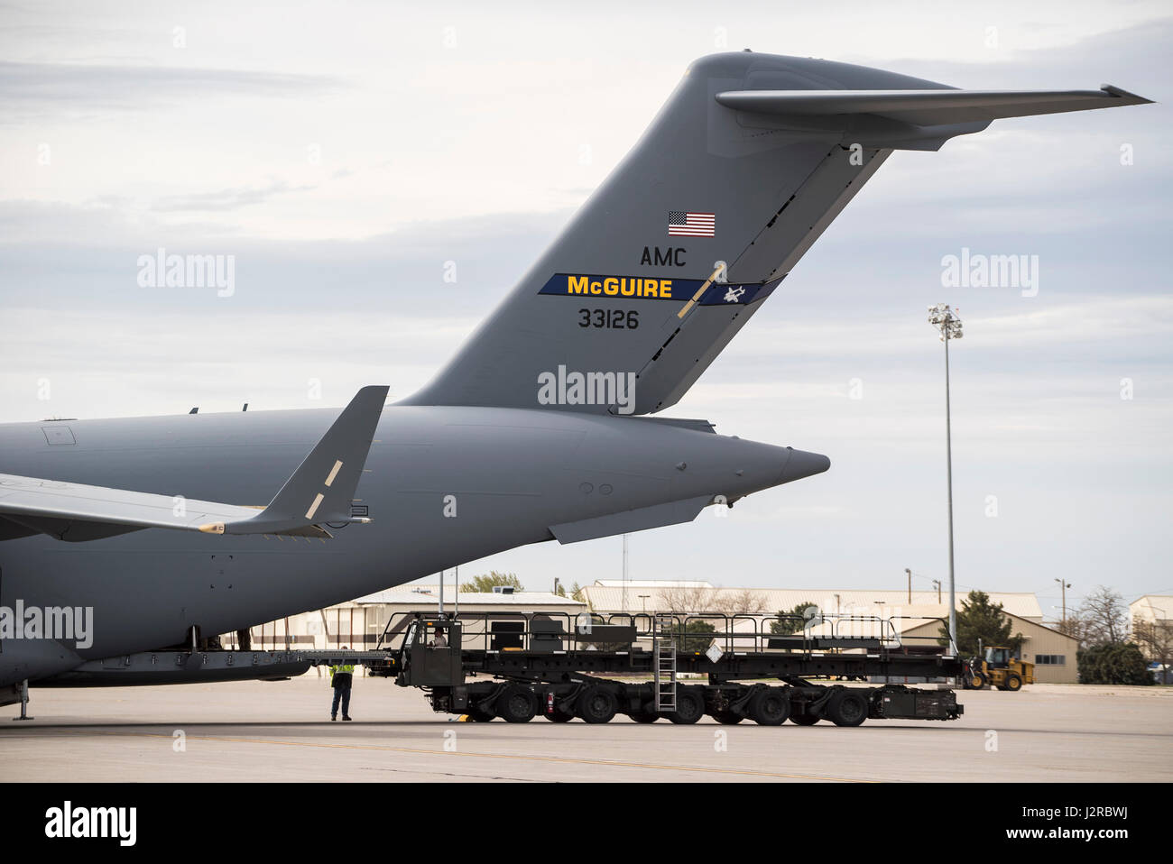 Airmen from the 366th Logistics Readiness Squadron prepare a K-loader ...