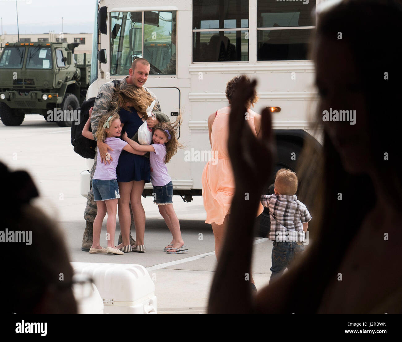 A family reunites at Mountain Home Air Force Base, Idaho, April 22 ...