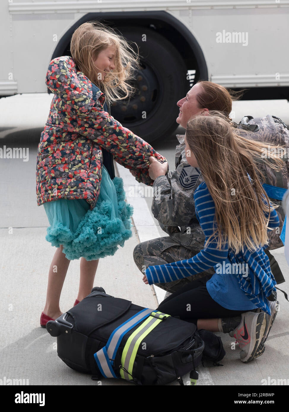 A family reunites at Mountain Home Air Force Base, Idaho, April 22 ...