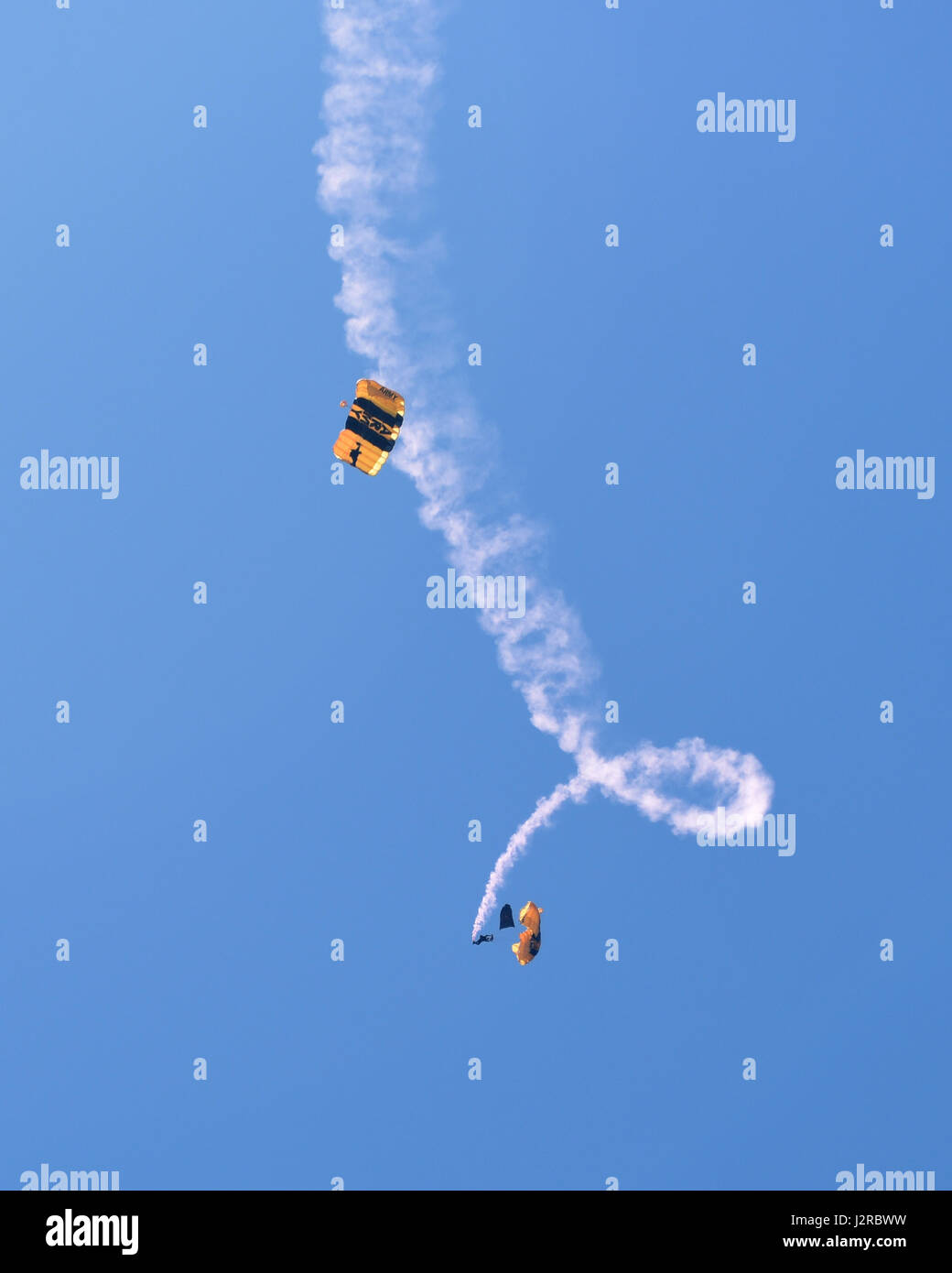 The U.S. Army Golden Knights team perform skydiving maneuvers during ...