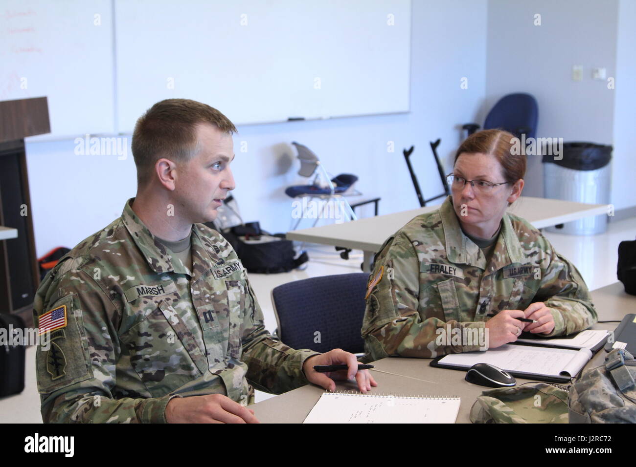SEAGOVILLE, Texas - Capt. Tyler Marsh and Command Sgt. Maj. Lita Fraley ...