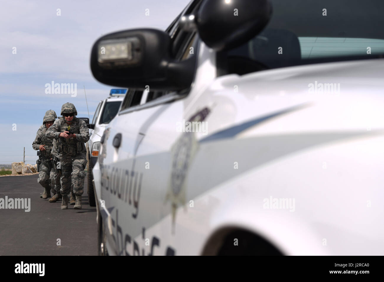 Senior Airman Rachel Kirk, 302nd Security Forces Squadron member, leads ...