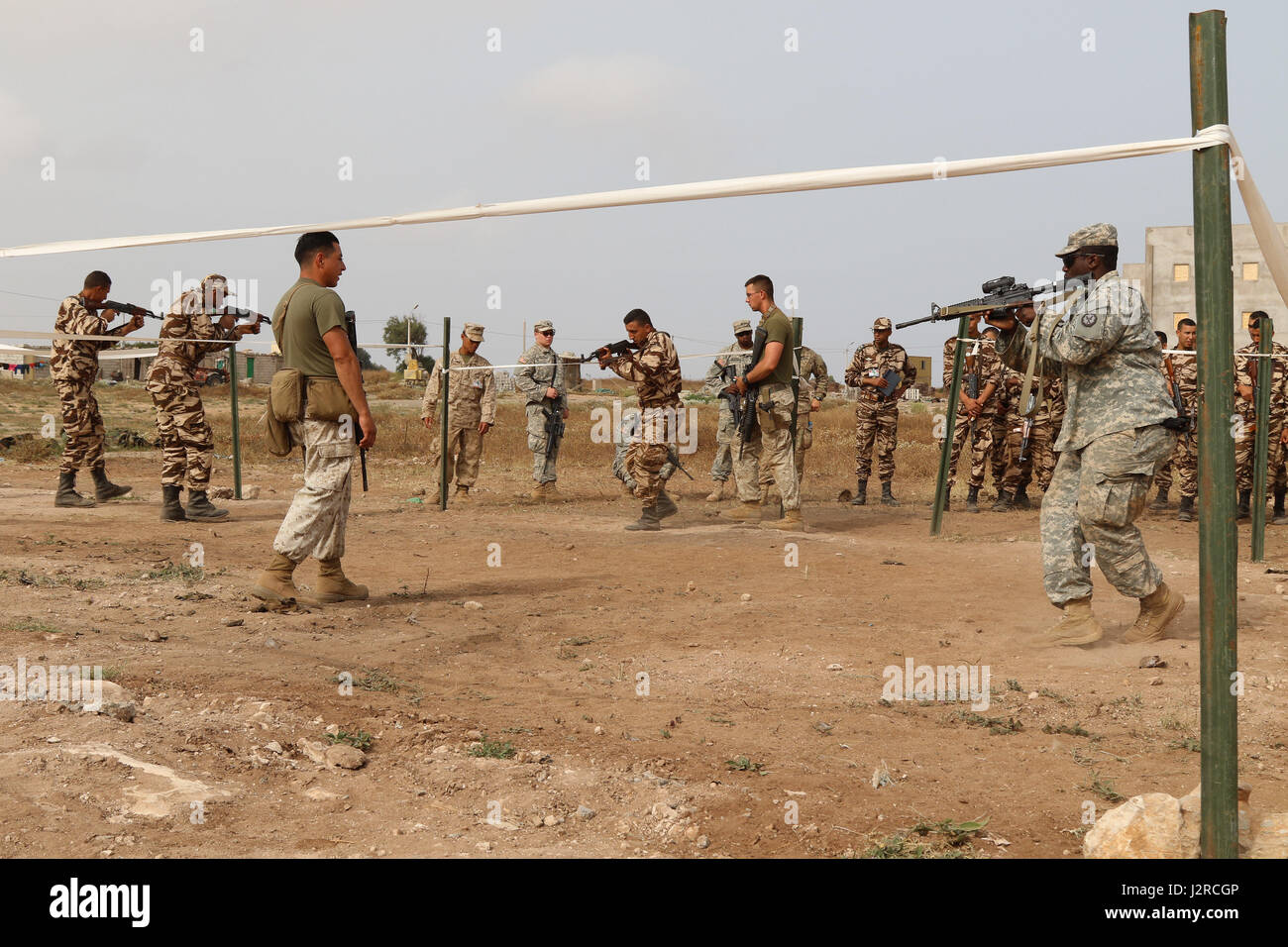 Marine close quarters battle instructors assist and observe U.S ...