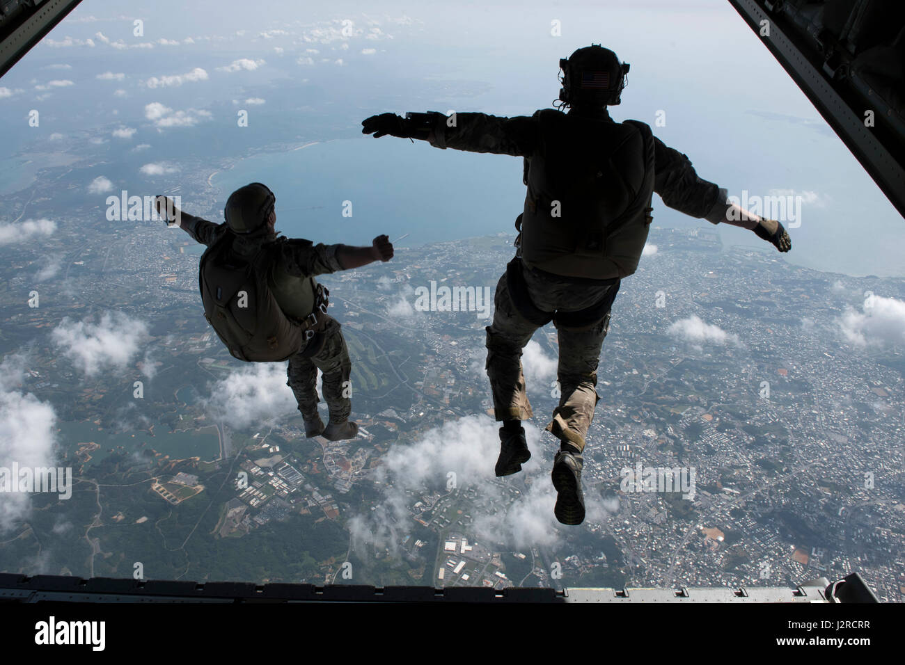 U.S. Army Soldiers conduct a high altitude, low opening jump off an MC ...