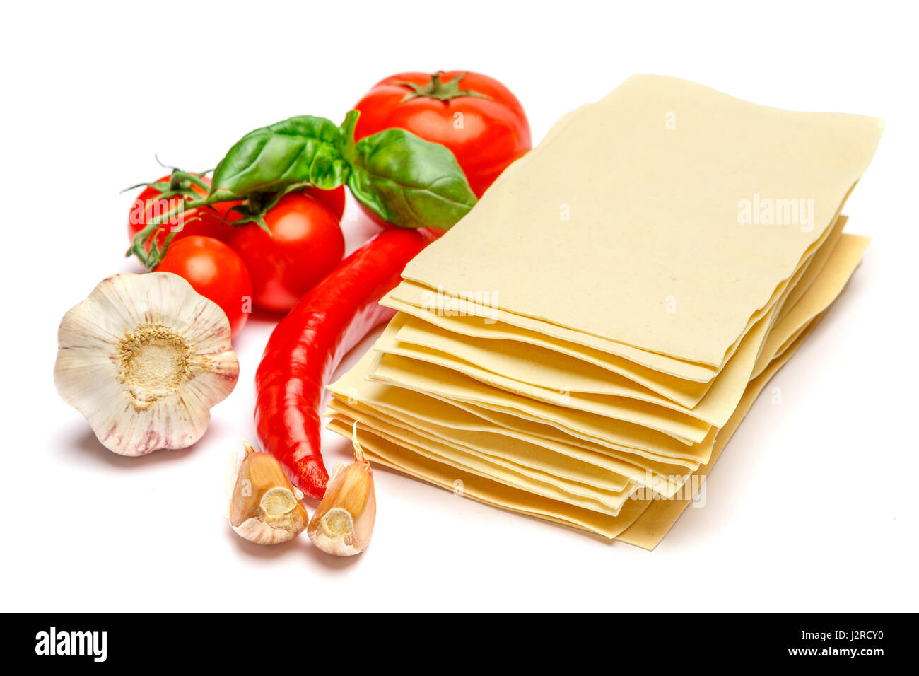 dried uncooked lasagna pasta sheets and vegetables Stock Photo - Alamy