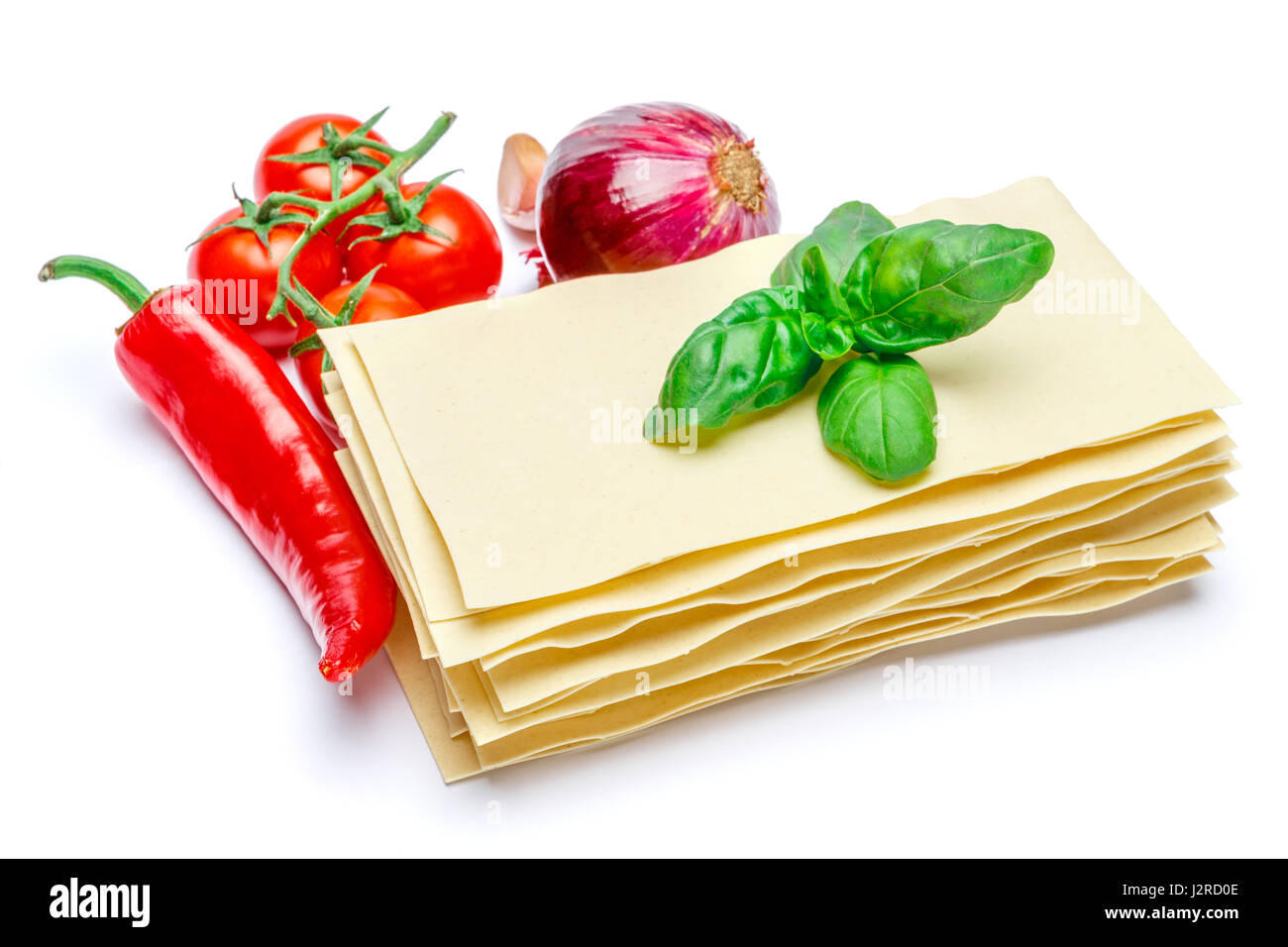 dried uncooked lasagna pasta sheets and vegetables Stock Photo - Alamy