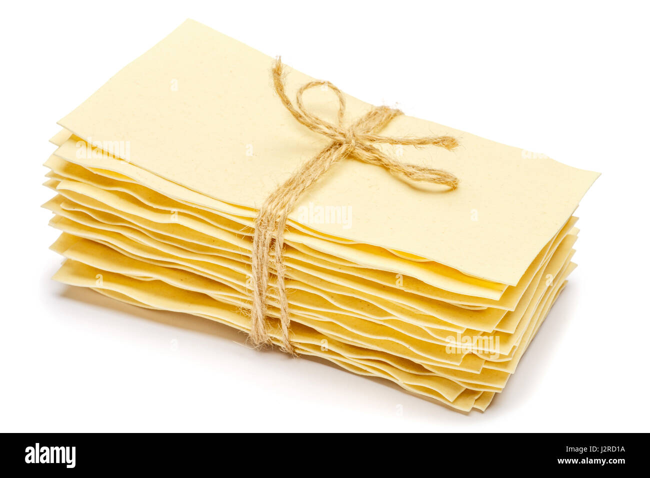 pile of dried uncooked lasagna pasta sheets Stock Photo - Alamy