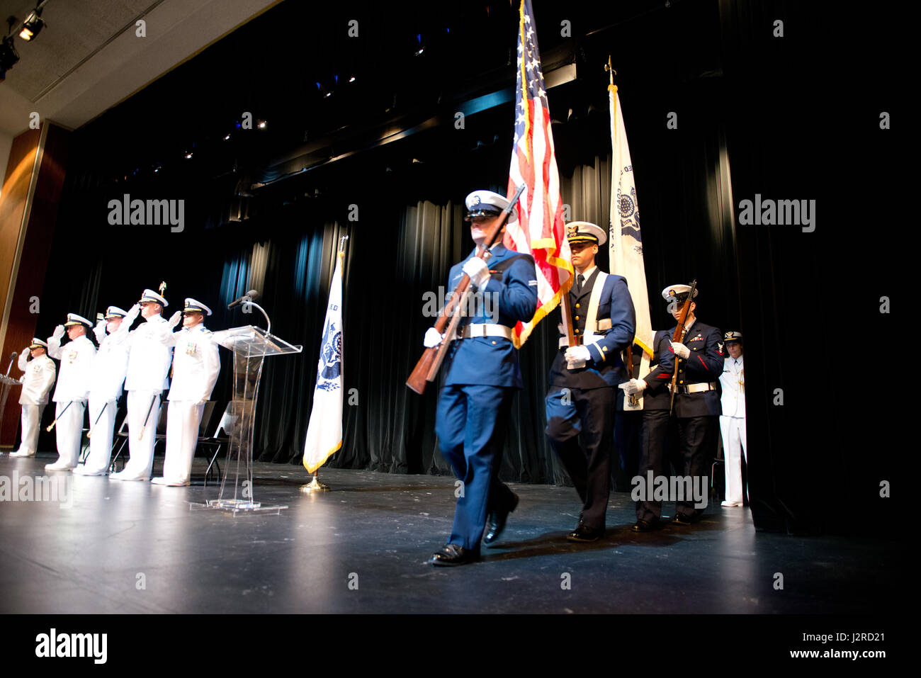 A Coast Guard Color Guard performs colors during a change-of-command ...