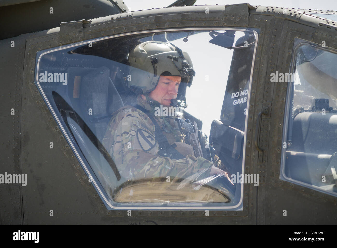 A U.S. Army AH-64E Apache helicopter pilot assigned to Task Force ...