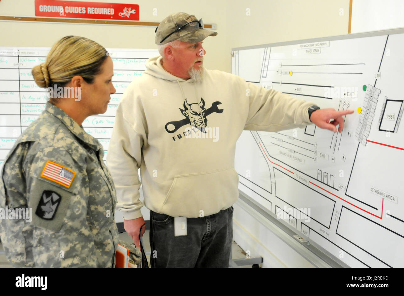 David Teelon, right, Fort McCoy Draw Yard manager, instructs Staff Sgt ...