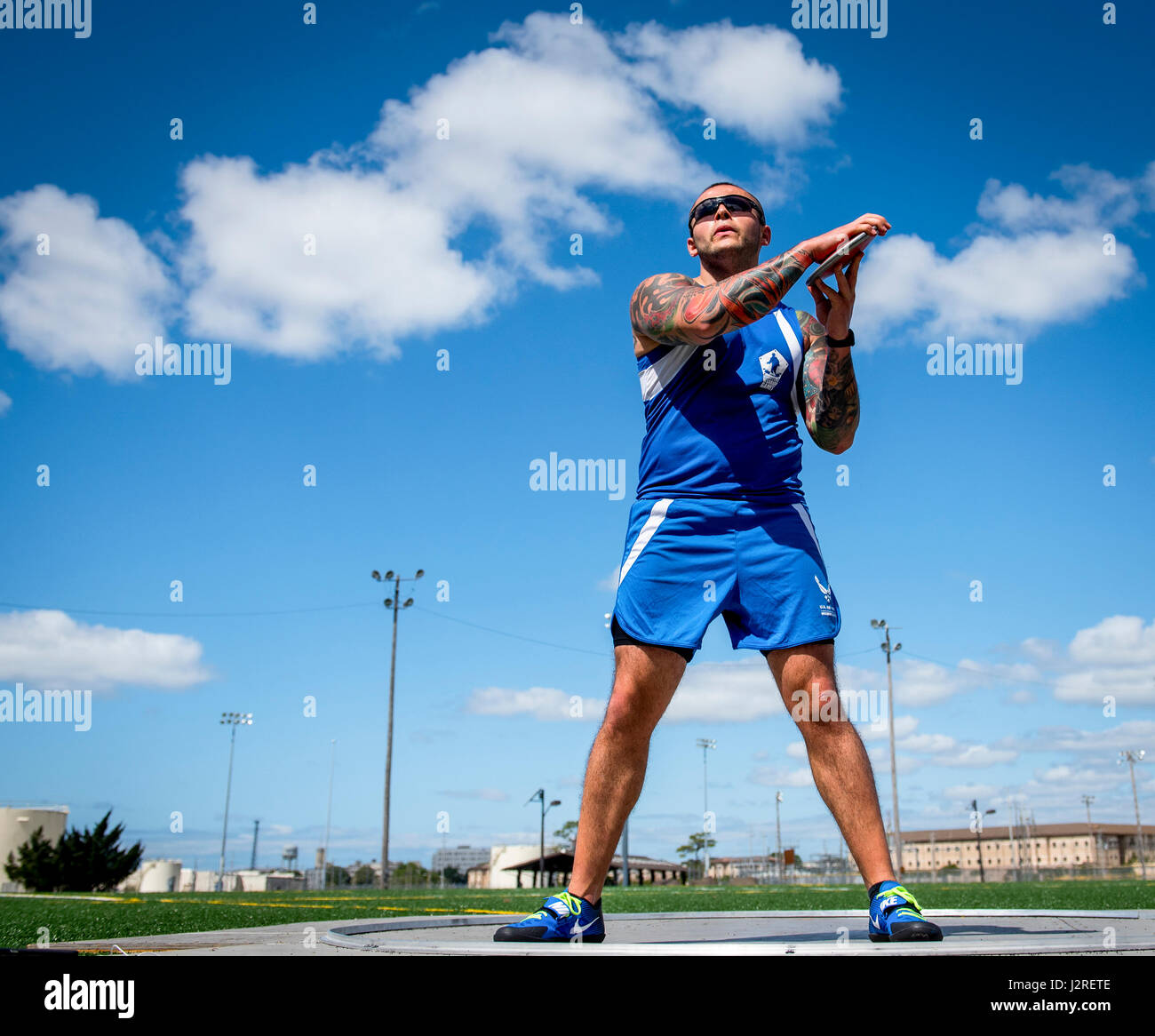 Rafael Morfin, a Warrior Games athlete, begins his discus rotation ...
