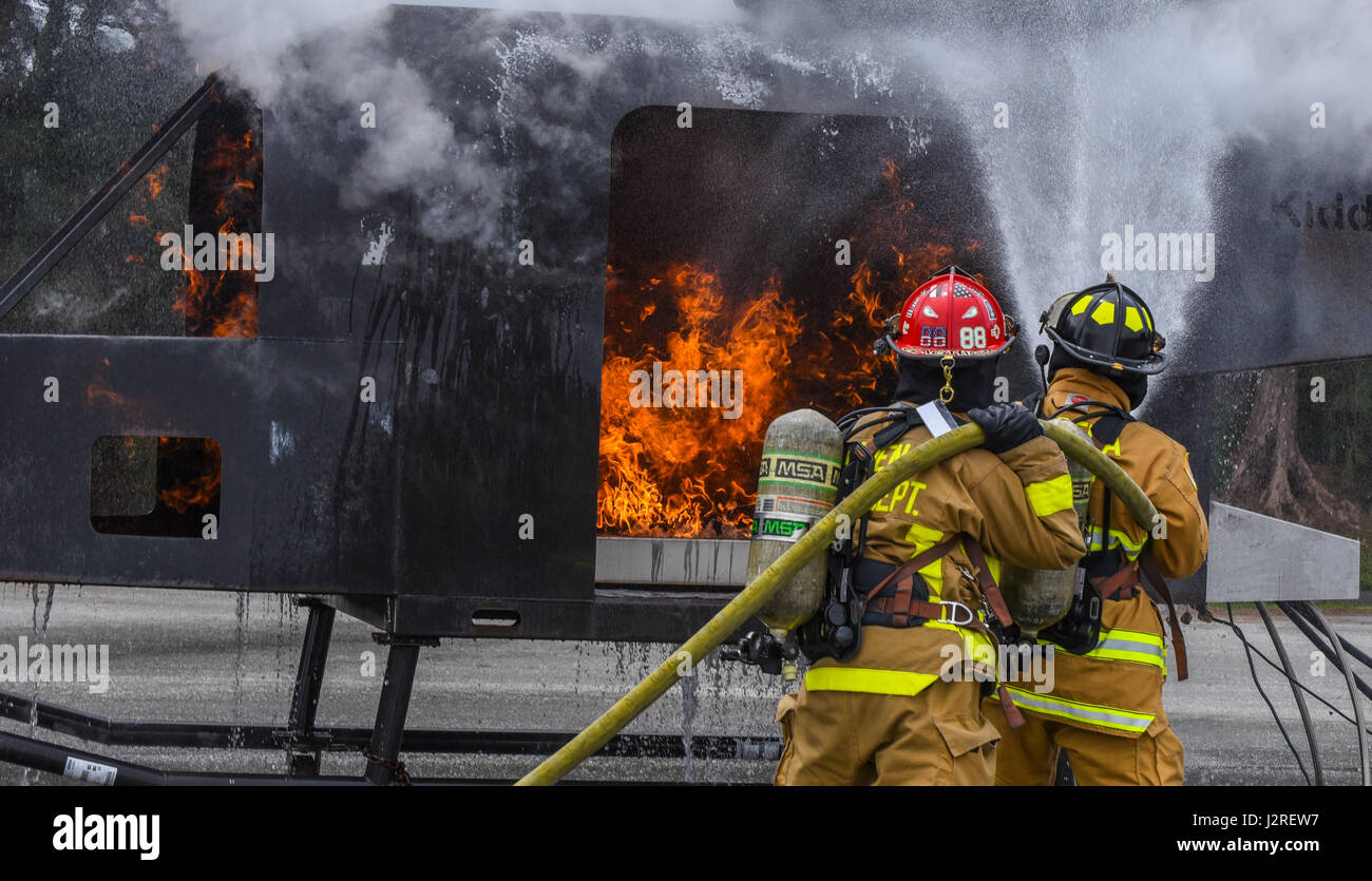 Air Force firefighters from the 18th Civil Engineer Squadron conduct ...