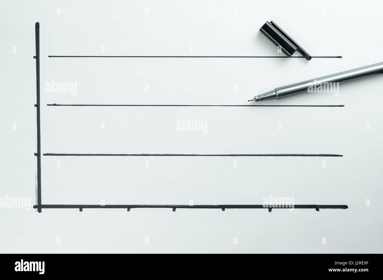 blank graph backdrop with pencil - top view Stock Photo - Alamy
