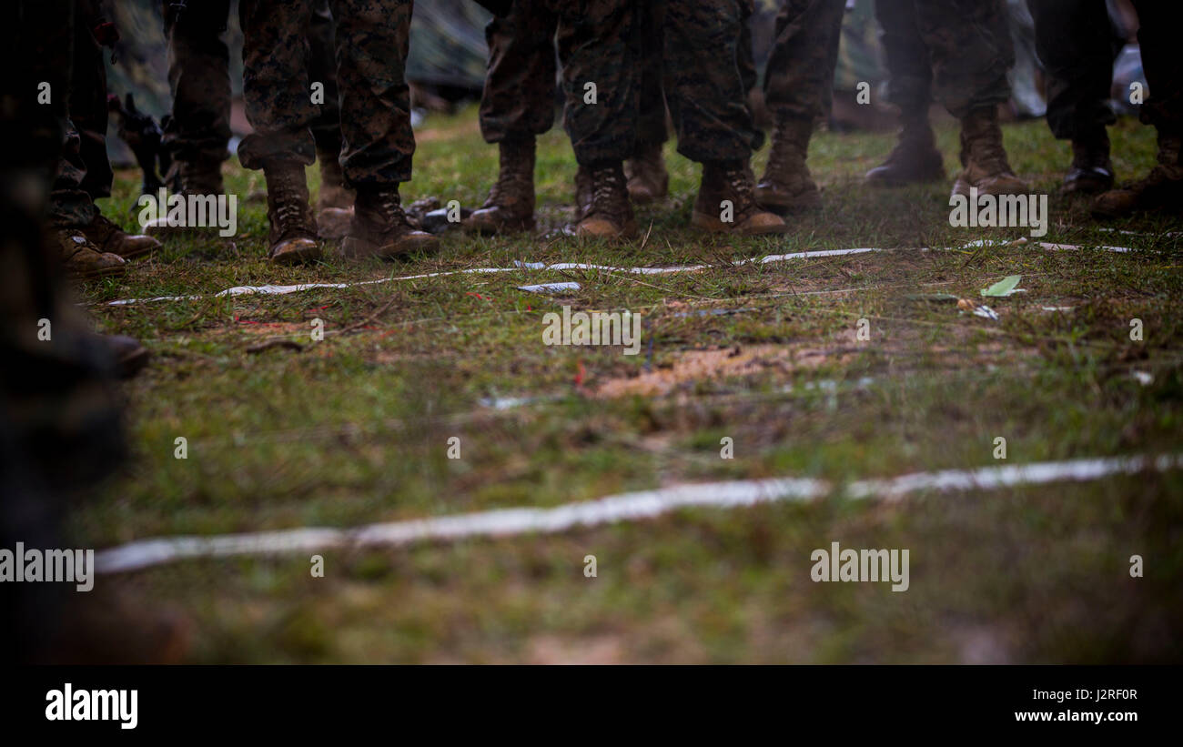 Marines observe a terrain model at Central Training Area, Camp Hansen ...