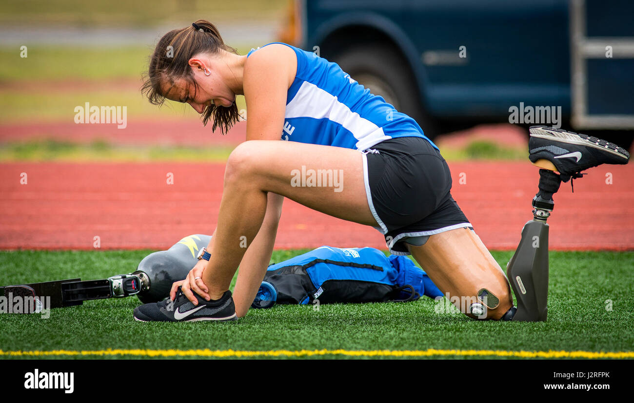 Christy Wise, a Warrior Games athlete, stretches after a run during a ...