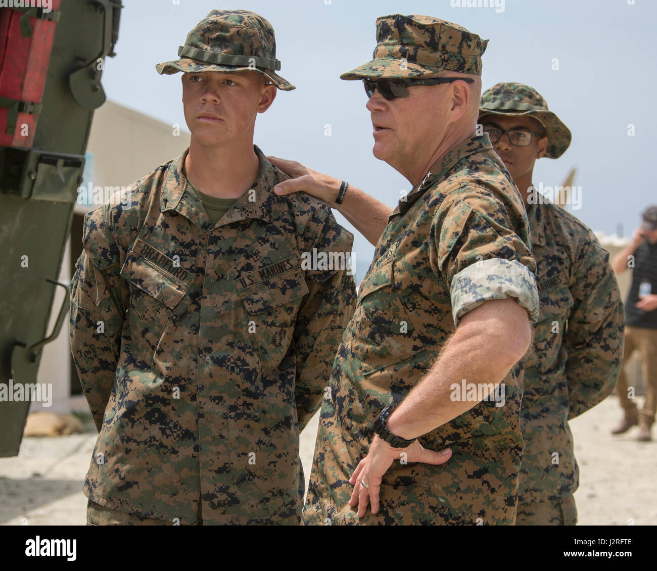 Commandant of the Marine Corps Gen. Robert B. Neller speaks with ...