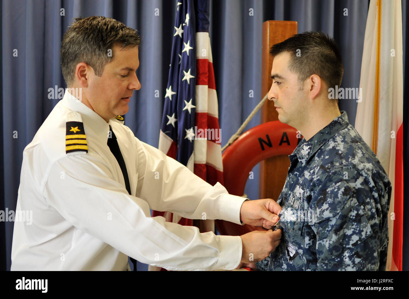Naval personnel at NAF Misawa, Japan, awarded the Navy and Marine Corps ...