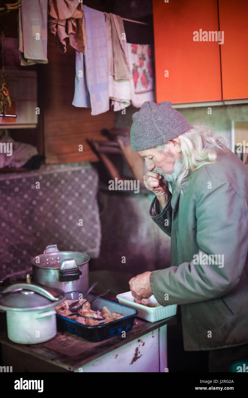 Poor poverty senior eating hi-res stock photography and images - Alamy