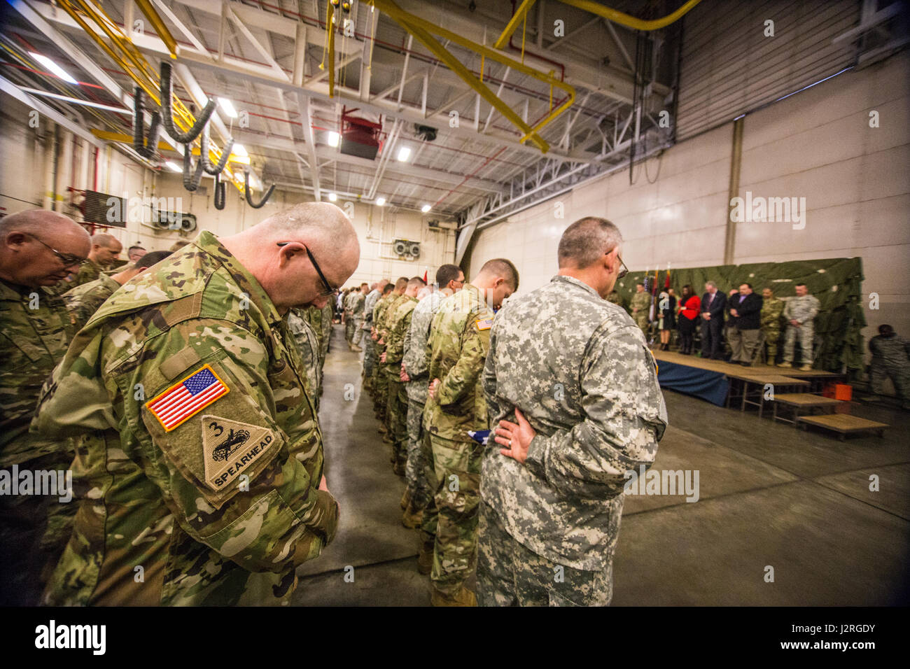Guardsmen with the 35th Infantry Division, Missouri National Guard, bow ...