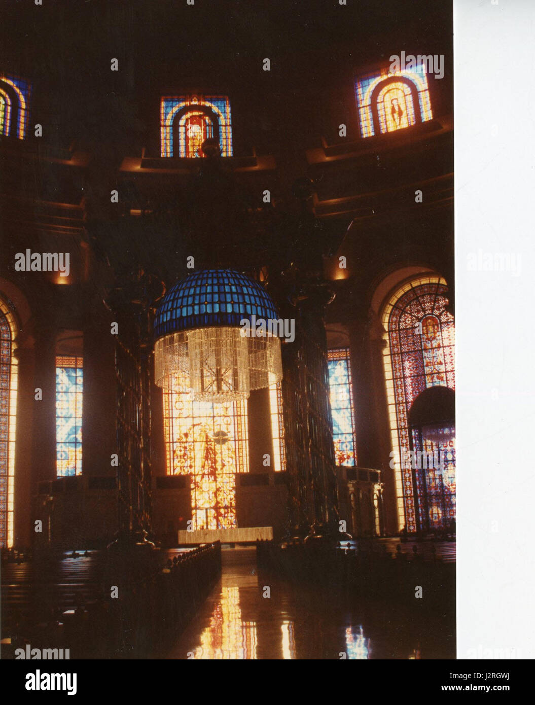 THIS IS THE INSIDE OF THE CHURCH SHOWING STAIN GLASS WINDOWS Stock ...