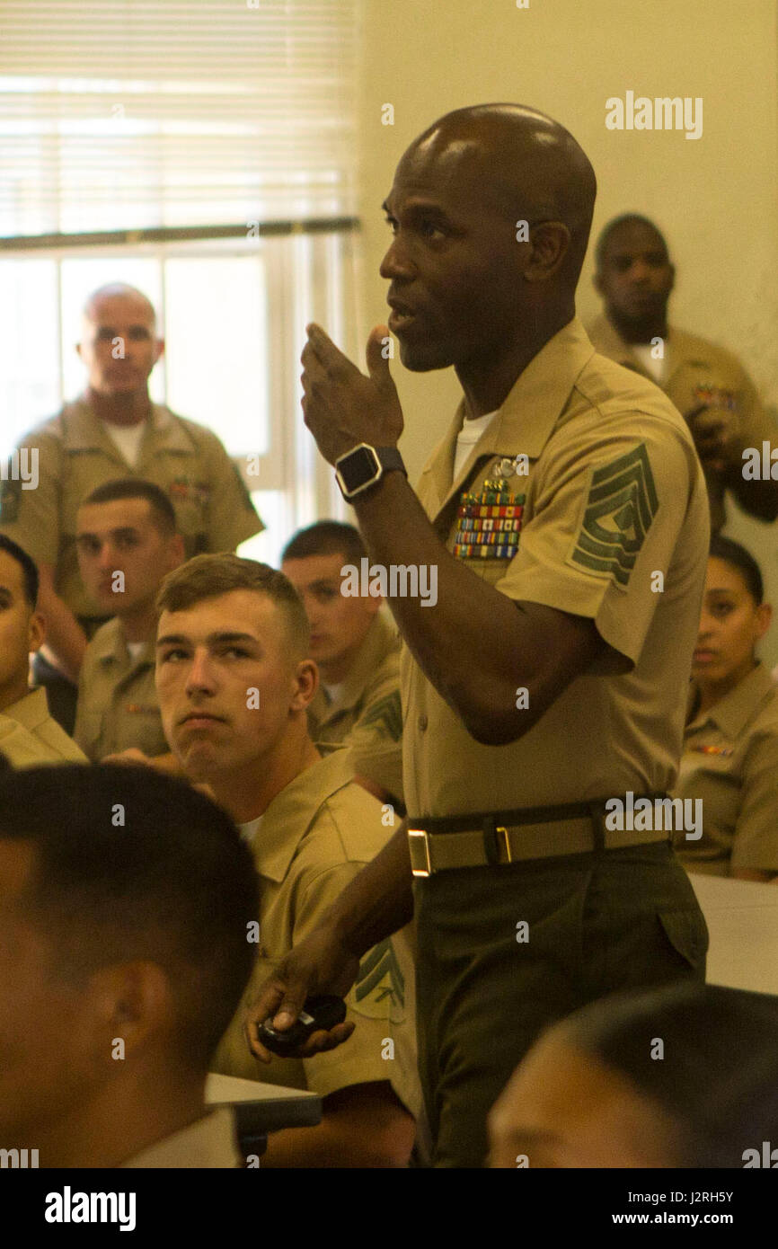 U.S. Marine 1st Sgt. Lynn D. C. Brown Sr. leads a guided discussion ...