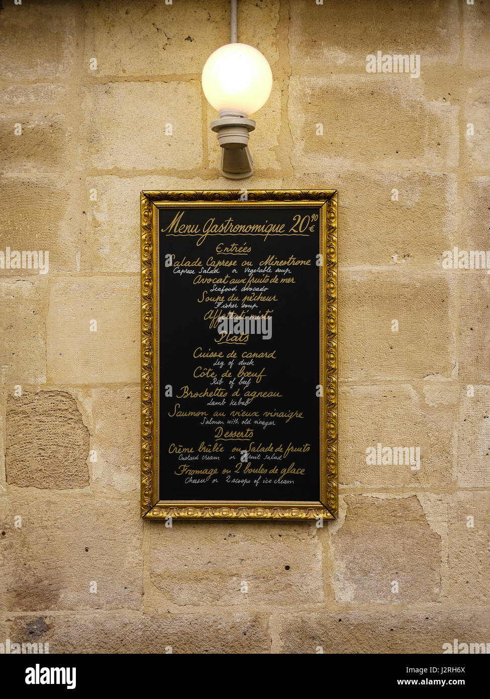 Menu board on the wall of a restaurant in Paris, France Stock Photo - Alamy