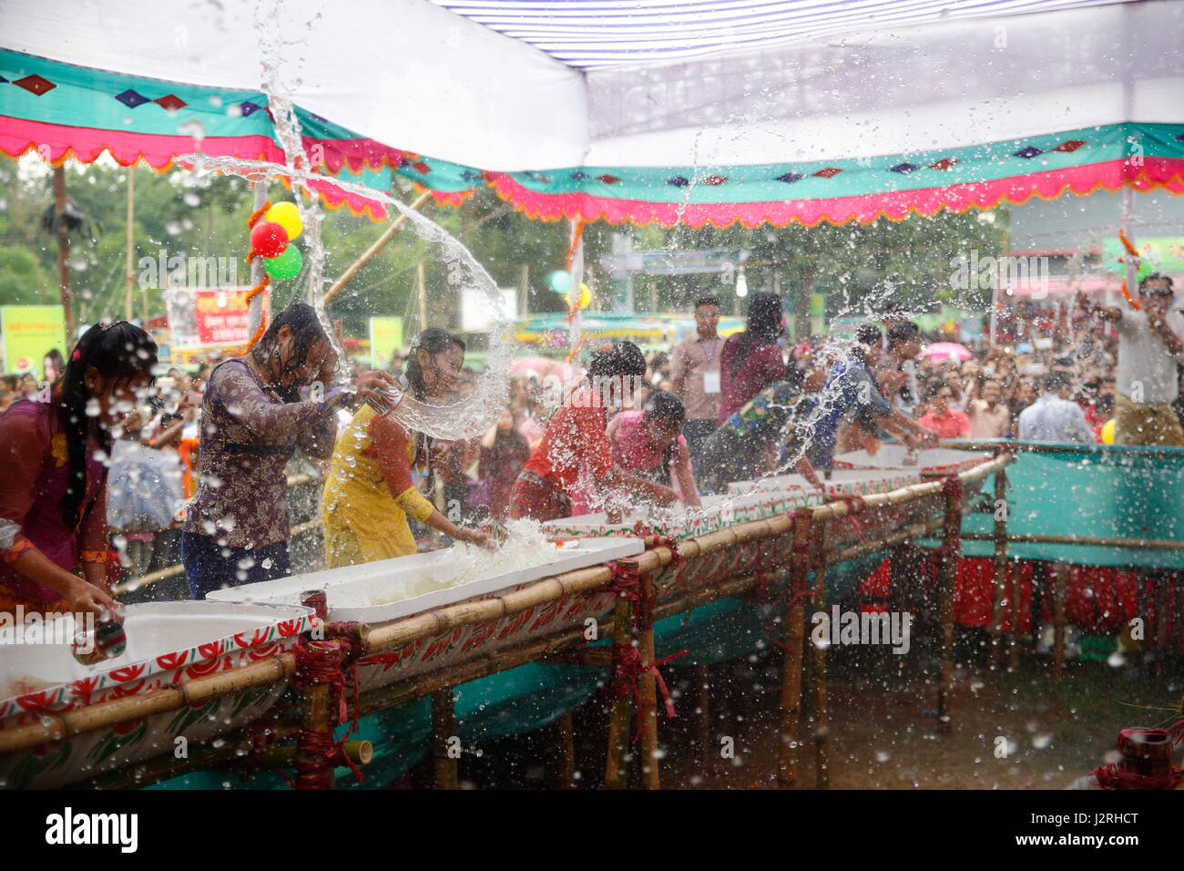 Ethnic Marma girls participate on water festival on occasion of Baisabi ...