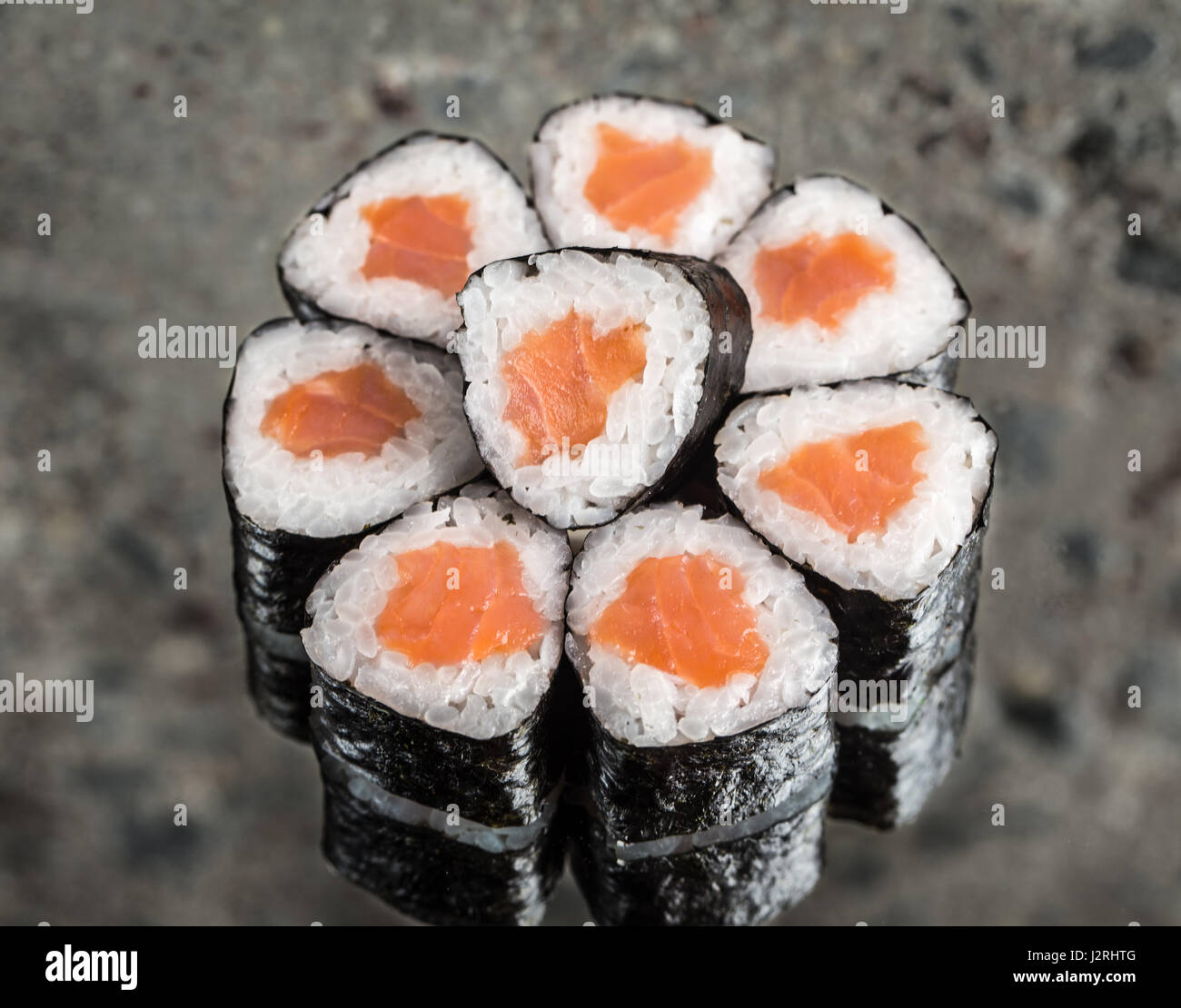 Mini roll with salmon Stock Photo - Alamy