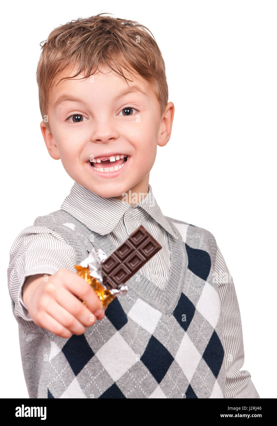 Little boy eating chocolate Stock Photo - Alamy
