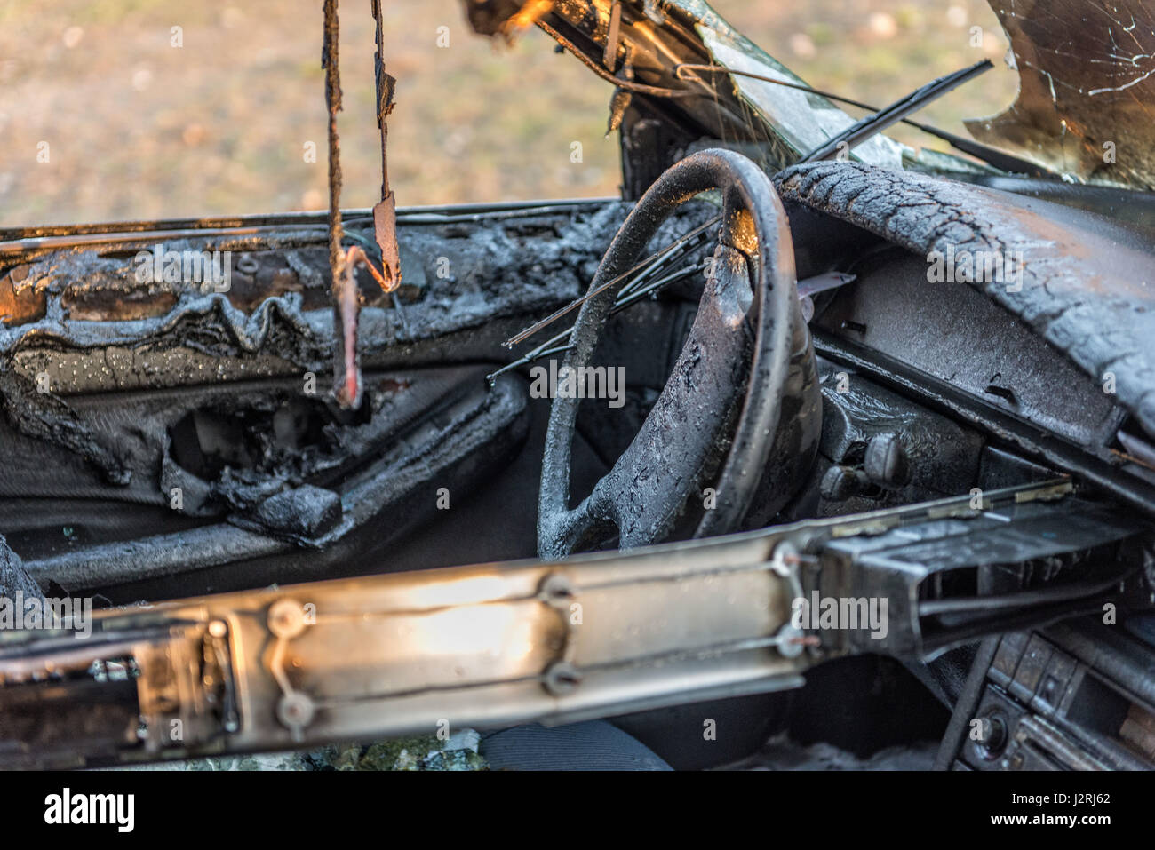 Burnt out car in a traffic accident hi-res stock photography and images ...